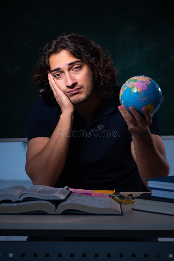 Young Male Student in the Classroom at Night Stock Photo - Image of ...