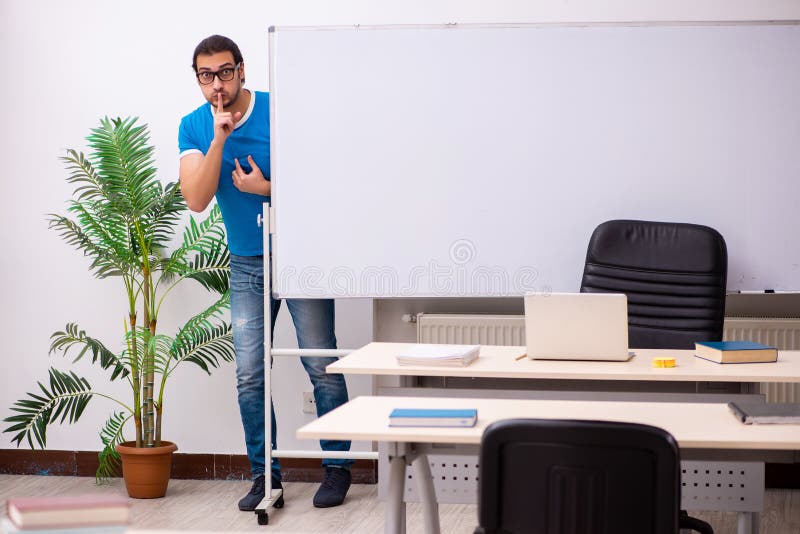 Young Male Student in the Classroom Stock Photo - Image of study ...