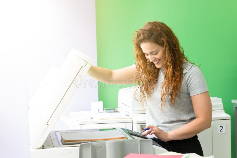 Young Student at a Copy Center Stock Photo - Image of paper, office ...