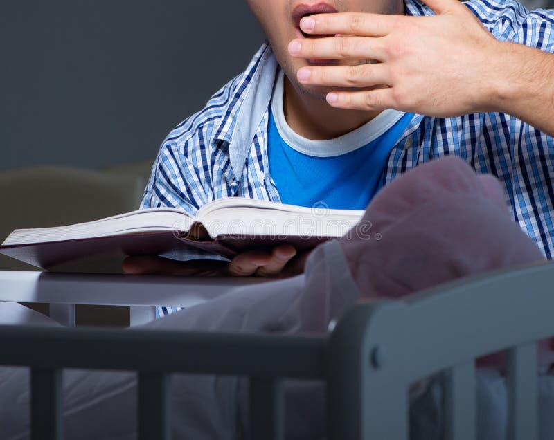 Young Student Doing Homework and Looking after Newborn Baby Stock Photo ...