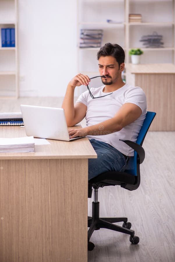 Young Male Student Employee at Workplace Stock Photo - Image of desk ...