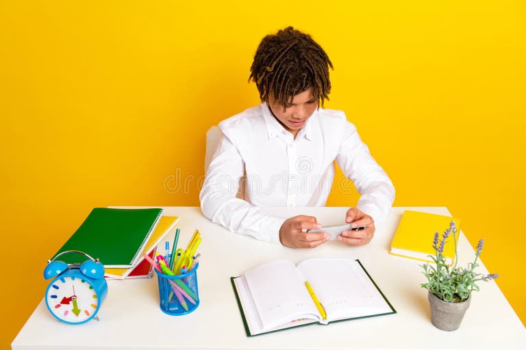 Young Student Exploring a Classroom Activity with Tools on a Yellow ...