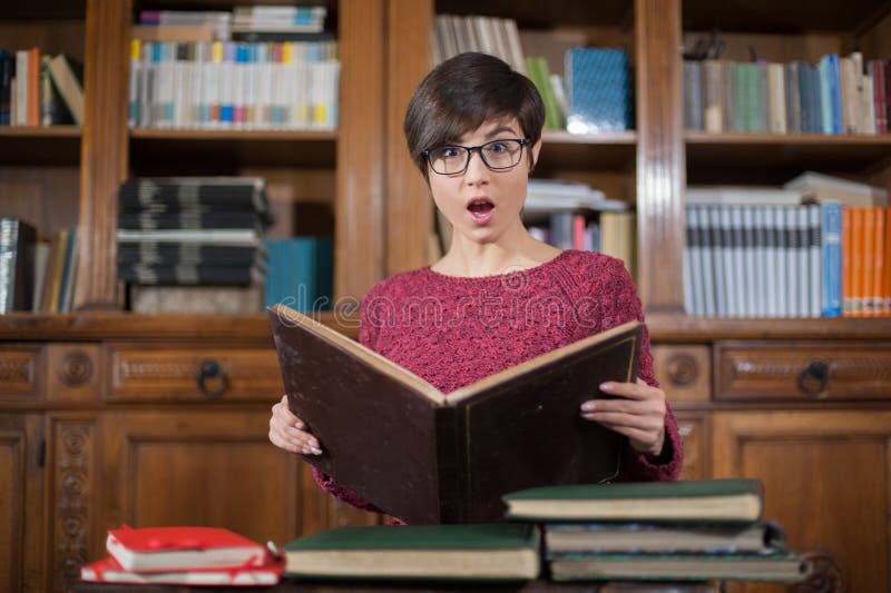 Young Student Find Solution on a Book Stock Photo - Image of expression ...