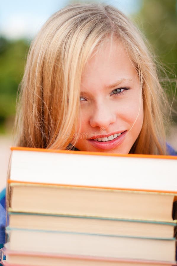 Young Student Girl with Pile of Books Stock Photo - Image of pile ...