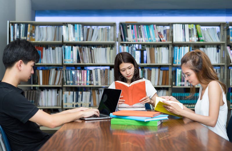 Young Student Group Reading Book Stock Image - Image of asian, book ...