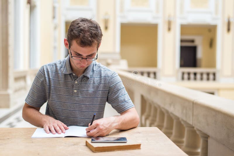 Young student guy learning stock image. Image of clever - 98783769