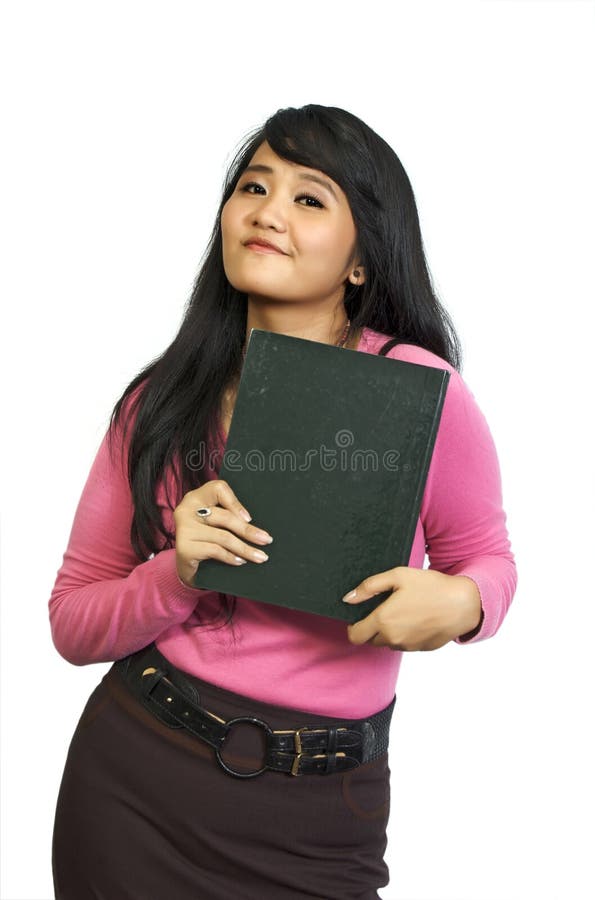 Young Student Holding Book stock image. Image of brunette - 11705895