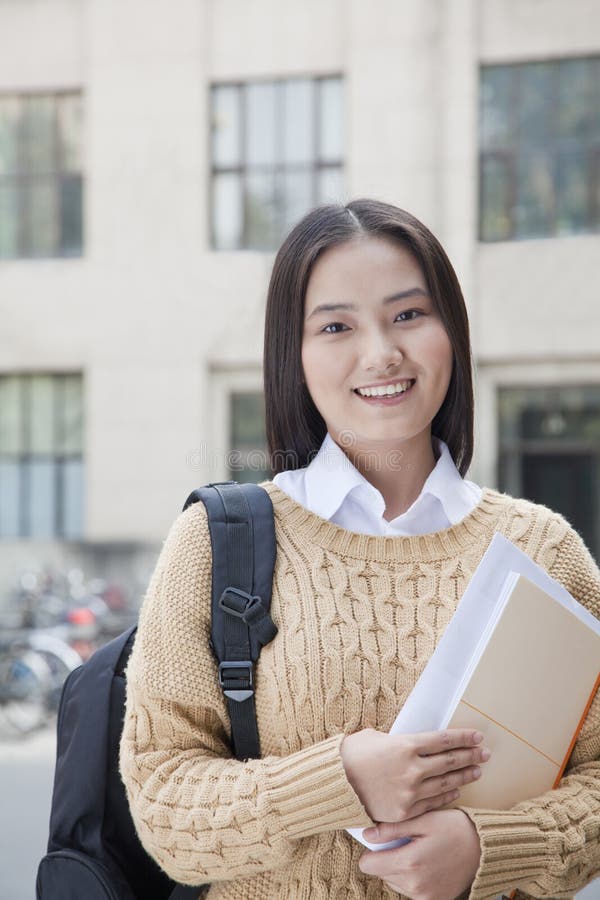 Young Student Holding Books, Portrait Stock Photo - Image of city ...