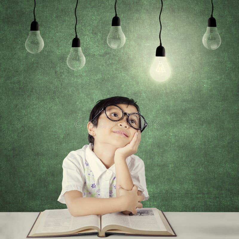 Young Student Look at the Bright Light Bulb Stock Photo - Image of ...