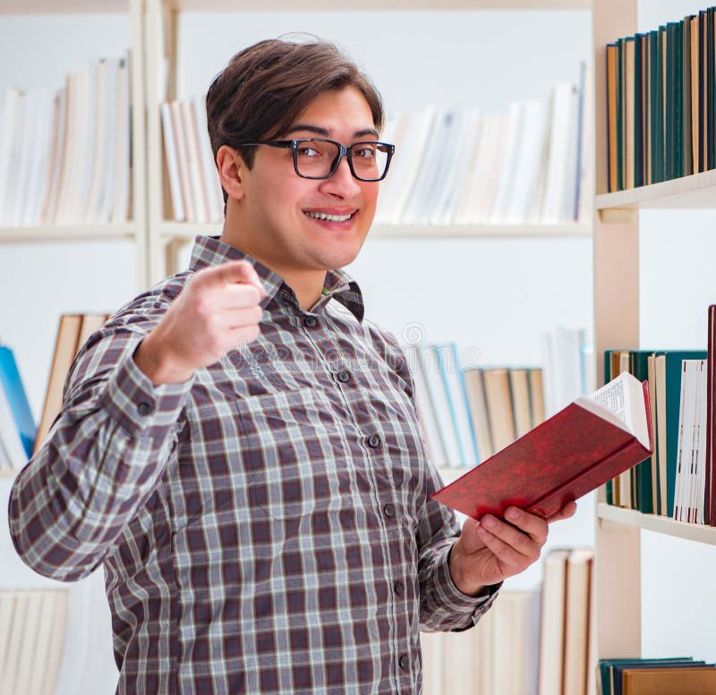 Young Student Looking for Books in College Library Stock Photo - Image ...