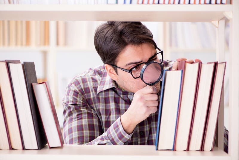 The Young Student Looking for Books in College Library Stock Image ...