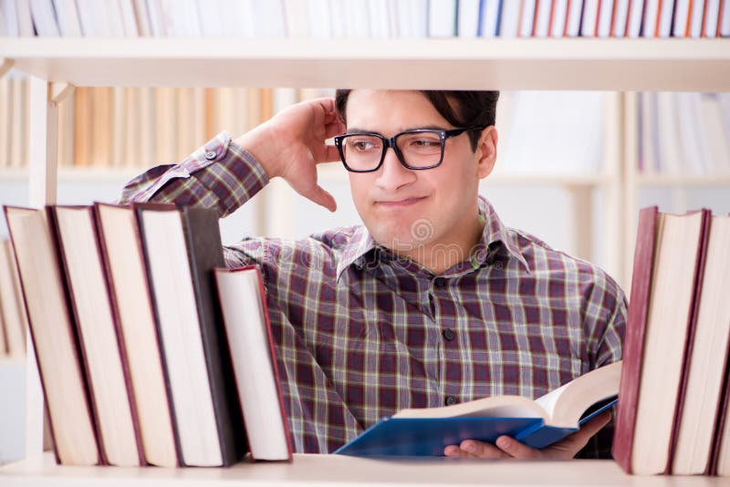 The Young Student Looking for Books in College Library Stock Image ...