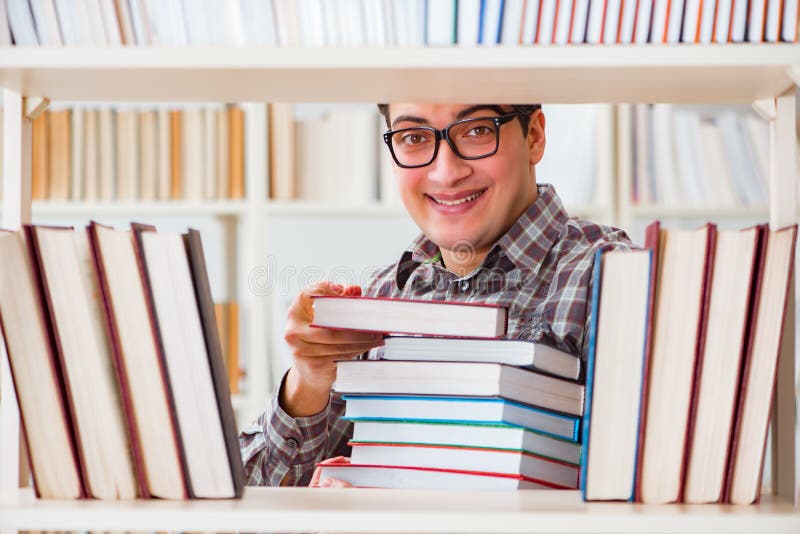 The Young Student Looking for Books in College Library Stock Image ...