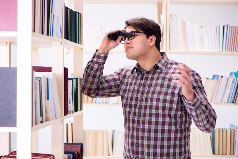 The Young Student Looking for Books in College Library Stock Image ...