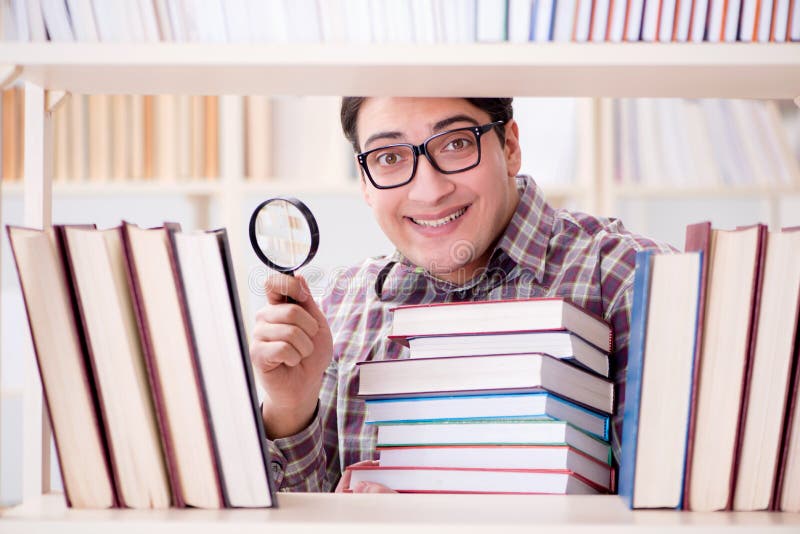 The Young Student Looking for Books in College Library Stock Photo ...