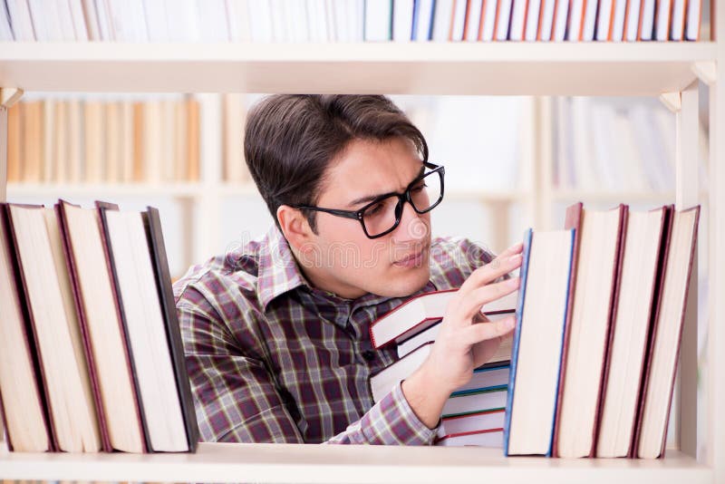 The Young Student Looking for Books in College Library Stock Image ...