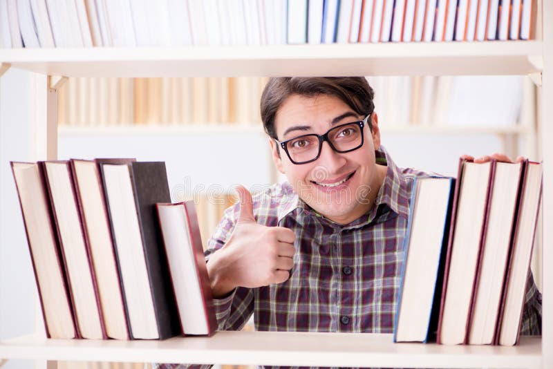 The Young Student Looking for Books in College Library Stock Image ...
