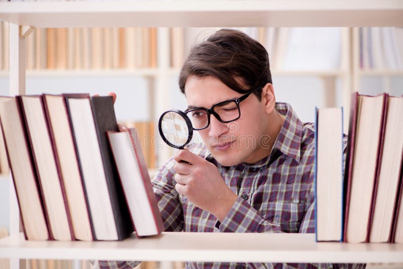 The Young Student Looking for Books in College Library Stock Image ...