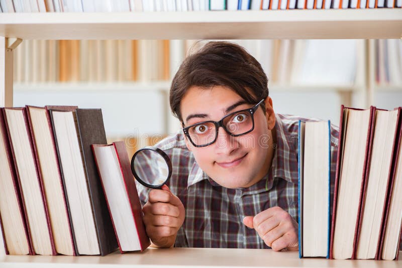 The Young Student Looking for Books in College Library Stock Image ...