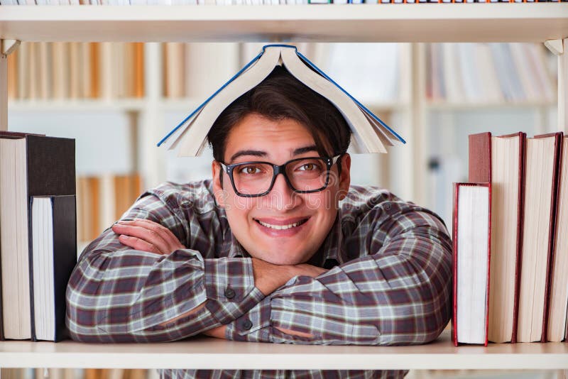 The Young Student Looking for Books in College Library Stock Image ...