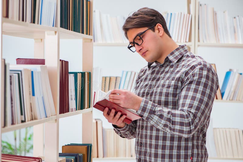 The Young Student Looking for Books in College Library Stock Image ...