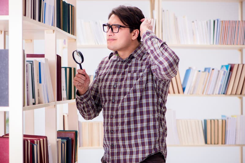 The Young Student Looking for Books in College Library Stock Image ...