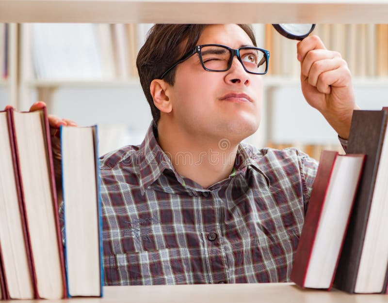 Young Student Looking for Books in College Library Stock Image - Image ...