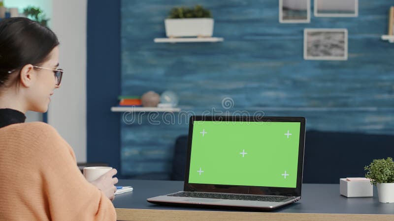 Young Student Looking at Green Screen on Laptop Computer Stock Image ...