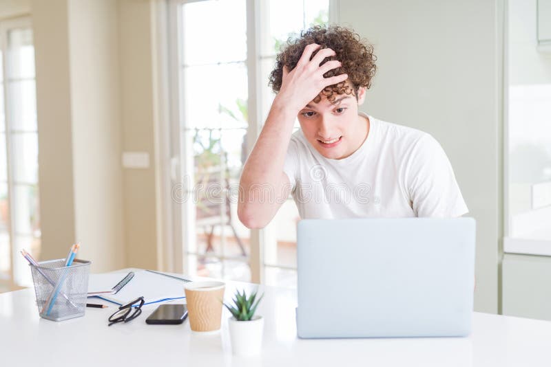 Young Student Man Working and Studying Using Computer Laptop Stressed ...