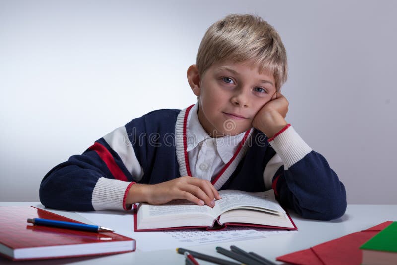 Young Student Reading a Book Stock Image - Image of reading, notes ...