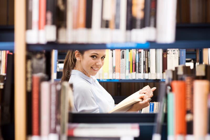Young Student Searching for Books Stock Image - Image of book ...