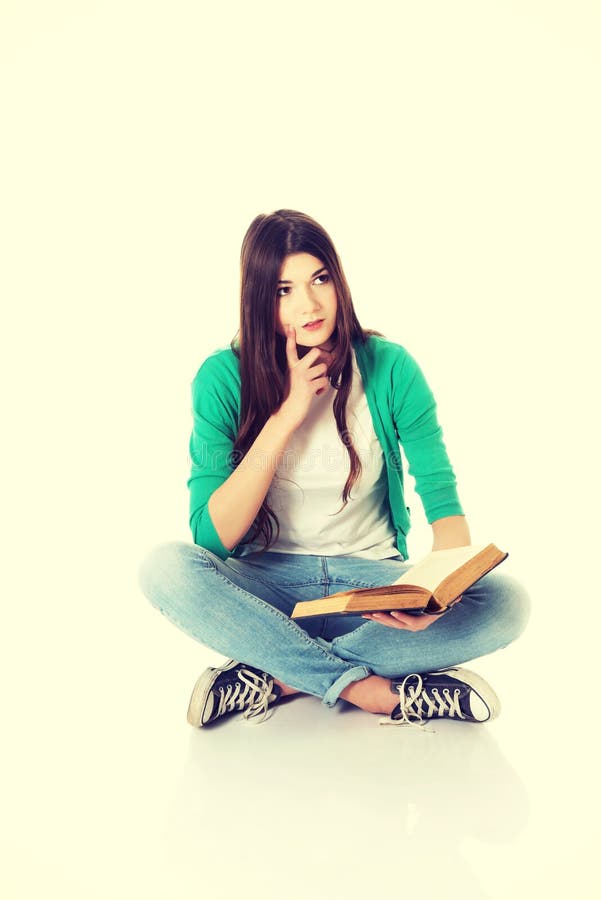 Young Student Sitting with Book, Reading. Stock Image - Image of ...