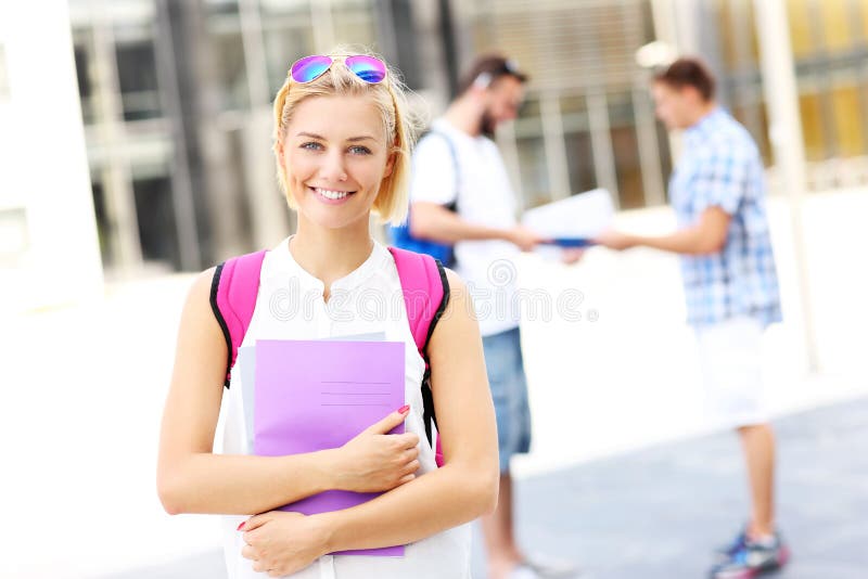 Young Student Standing and Smiling in the Campus Stock Photo - Image of ...