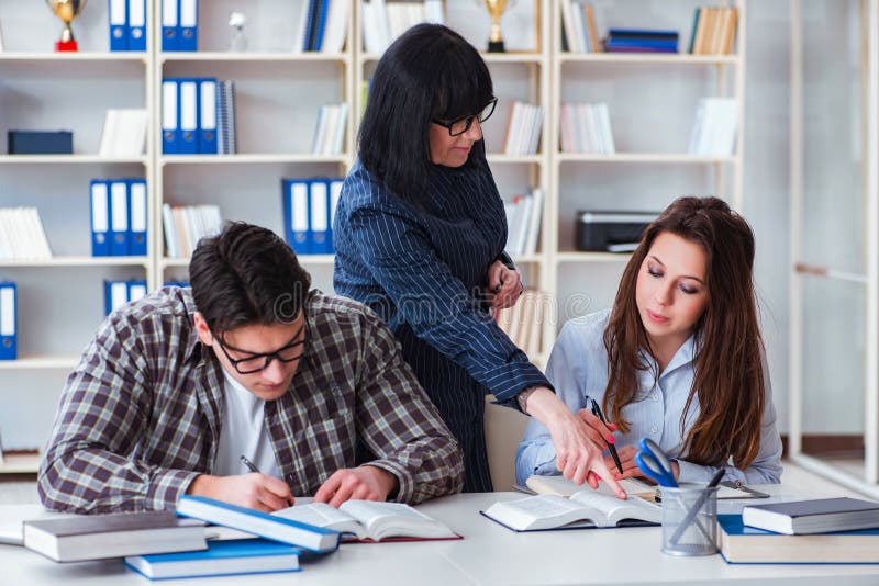 The Young Student and Teacher during Tutoring Lesson Stock Image ...