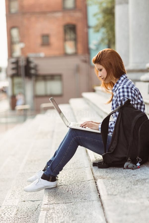 Young Student Using Her Laptop To Study Outside Stock Image - Image of ...