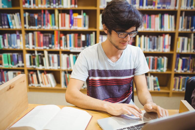 Young Student Using His Studies Stock Image - Image of college, desk ...