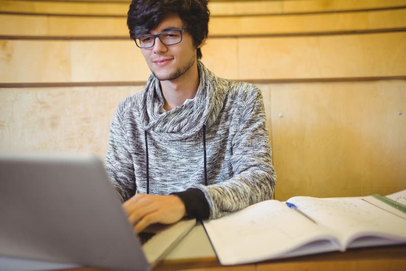 Young Student Using Laptop in Classroom Stock Photo - Image of adult ...
