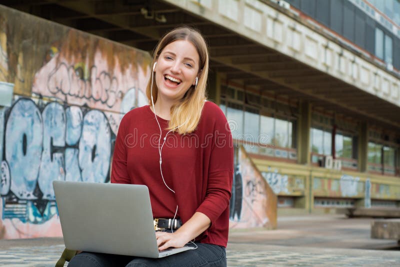 Young Student Using Laptop Outdoors Stock Image - Image of business ...