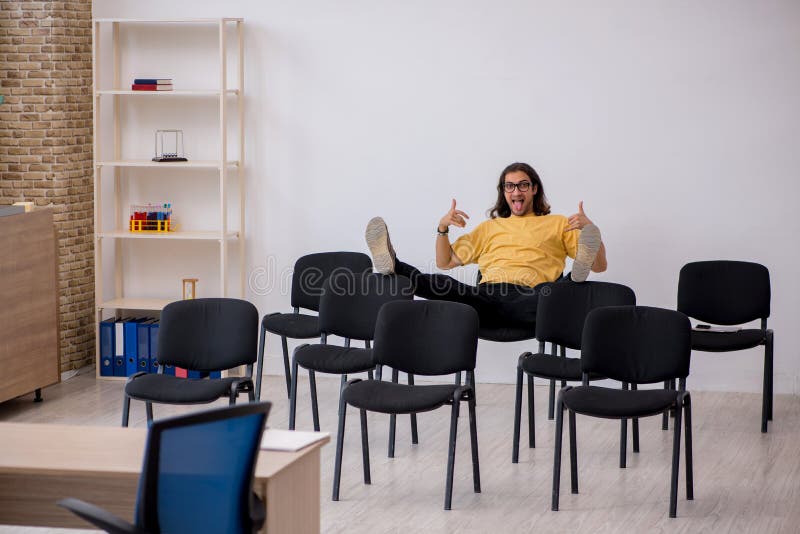 Young Male Student Waiting for Teacher in the Classroom Stock Image ...