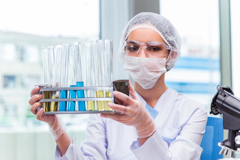 The Young Student Working with Chemical Solutions in Lab Stock Photo ...