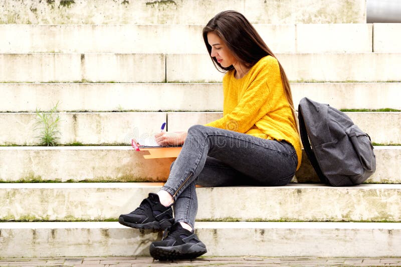 Young Student Working on Homework on Steps Stock Image - Image of ...