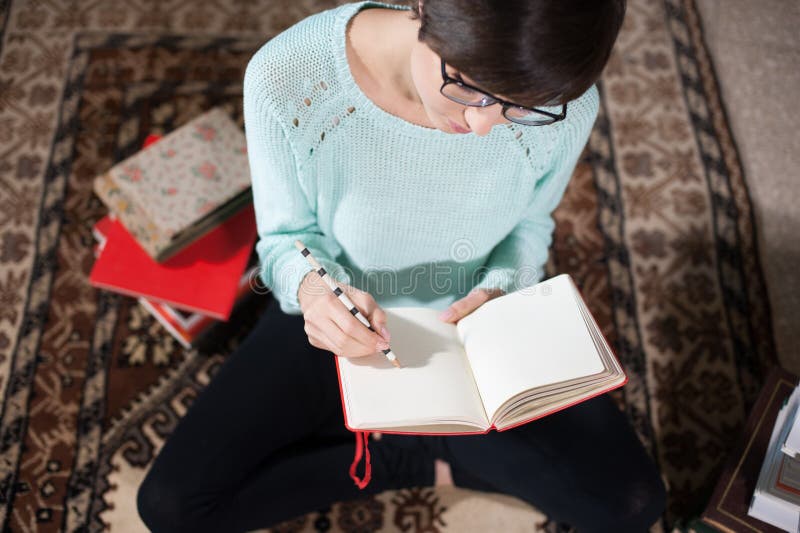 Young Student Writing Down Notes at Home Stock Image - Image of indoor ...