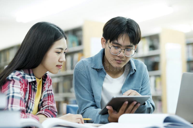Young Students Campus Helps Friend Catching Up and Learning. Stock Photo - Image of academic ...