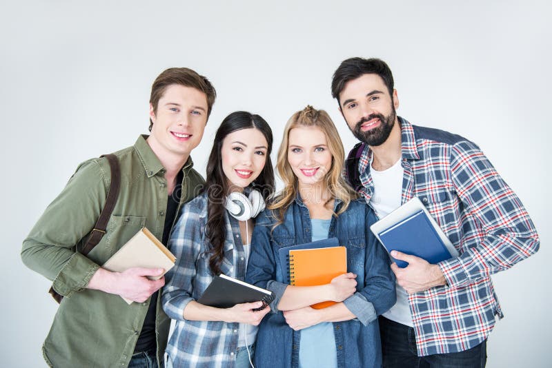 Young Students in Casual Clothes Holding Books on White Stock Photo ...