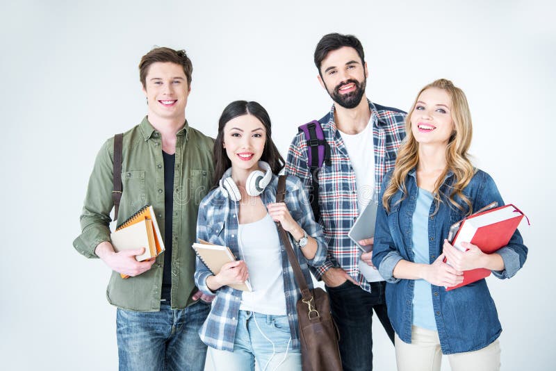 Young Students in Casual Clothes Holding Books on White Stock Image ...