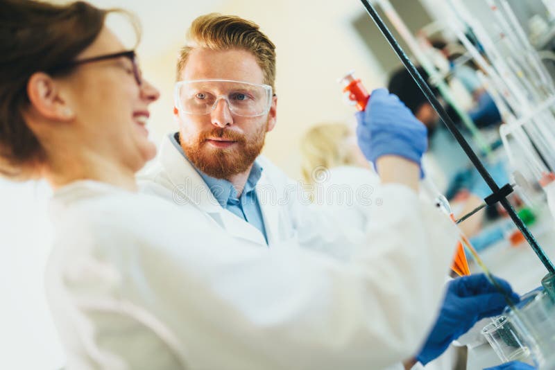 Young Students of Chemistry Working in Laboratory Stock Photo - Image ...