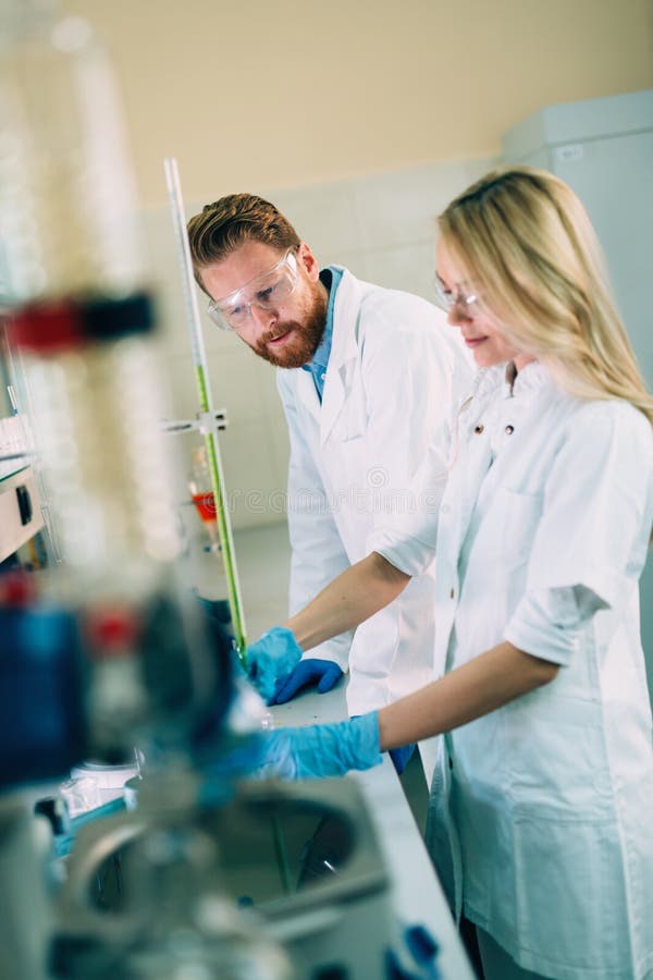 Young Students of Chemistry Working in Laboratory Stock Image - Image ...