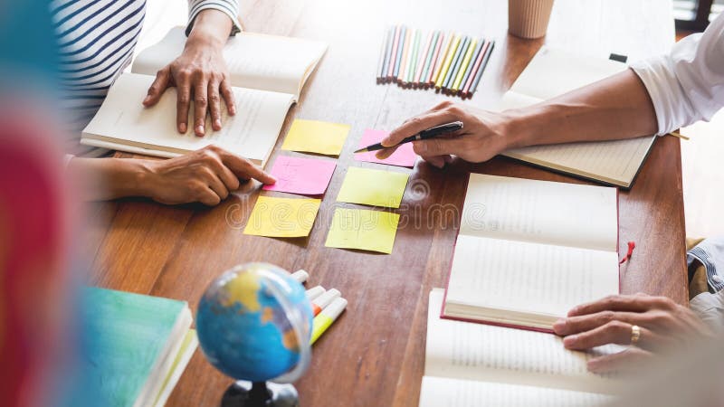 Young Students Classmates Help Friend Catching Up Workbook and Learning ...