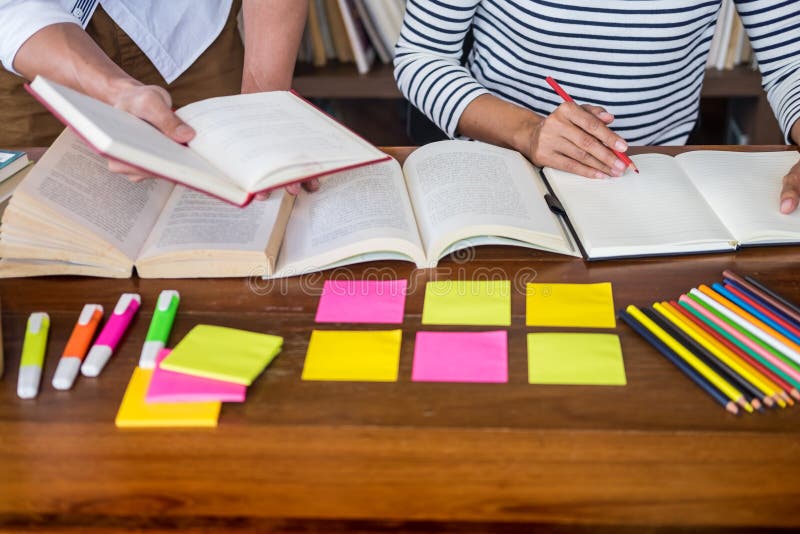 Young Students Classmates Help Friend Catching Up Workbook and Learning ...