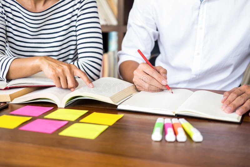 Young Students Classmates Help Friend Catching Up Workbook and Learning ...